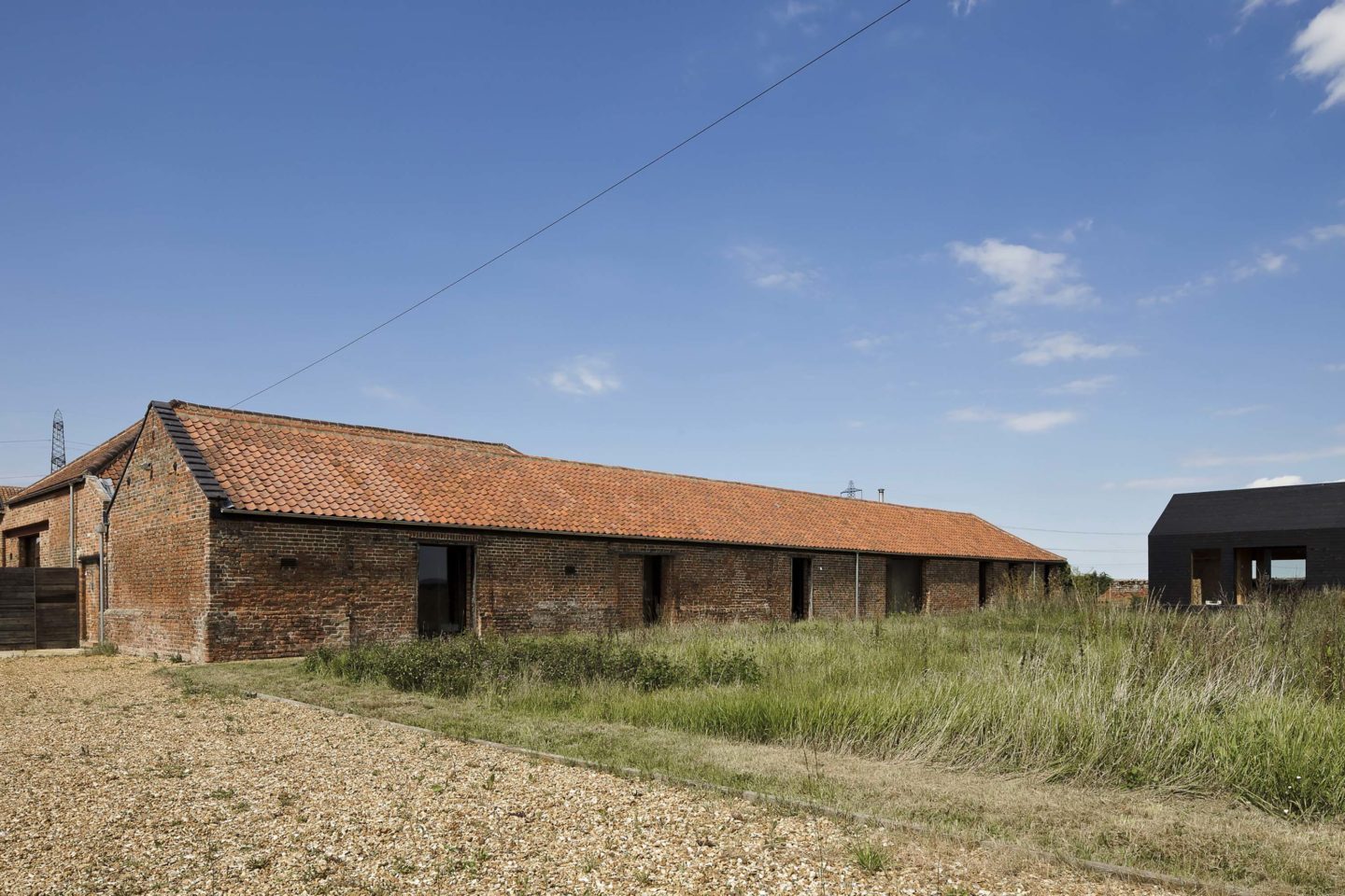 Aménagements en OSB dans une grange transformée en loft